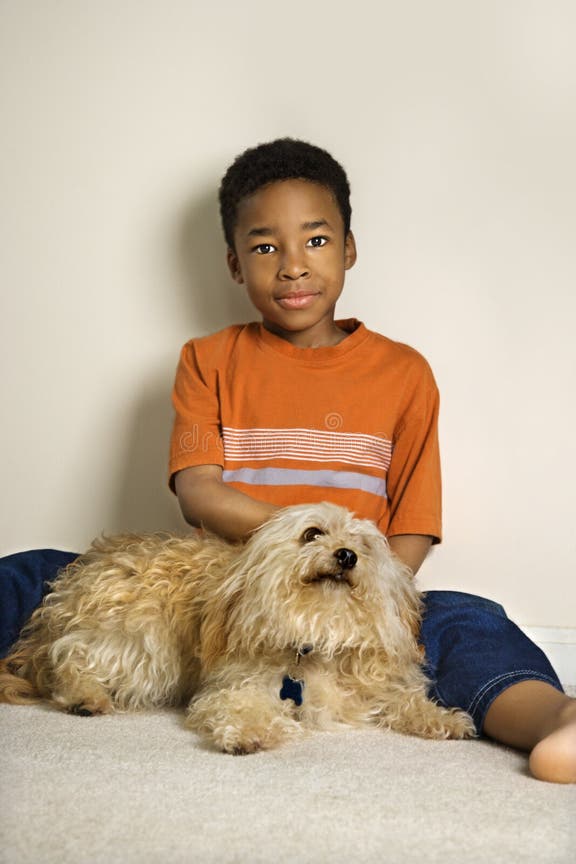 Young Boy with Dog stock image. Image of fluffy, american - 12753813