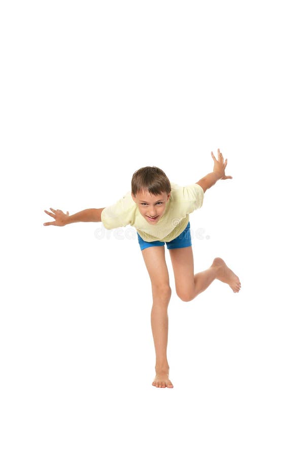 Young boy doing exercises stock image. Image of background - 121059393