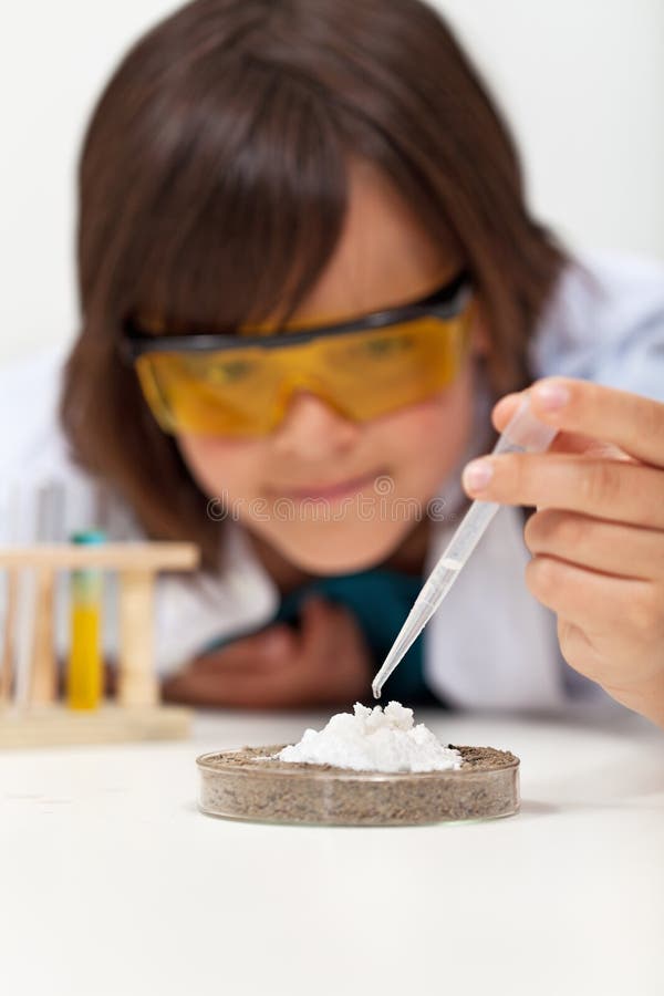 Young Boy Doing a Simple Chemical Experiment in Elementary School Stock ...