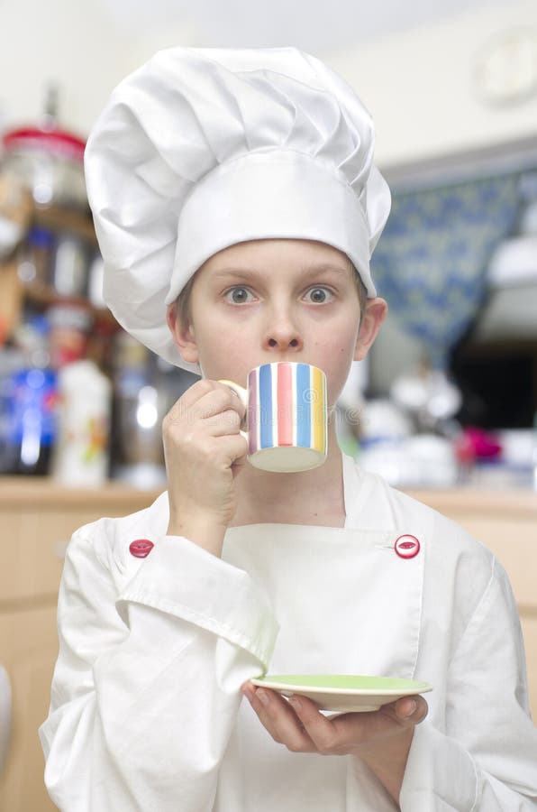Young Boy Dressed As Chef Drinking Tea White Background Stock Photos ...