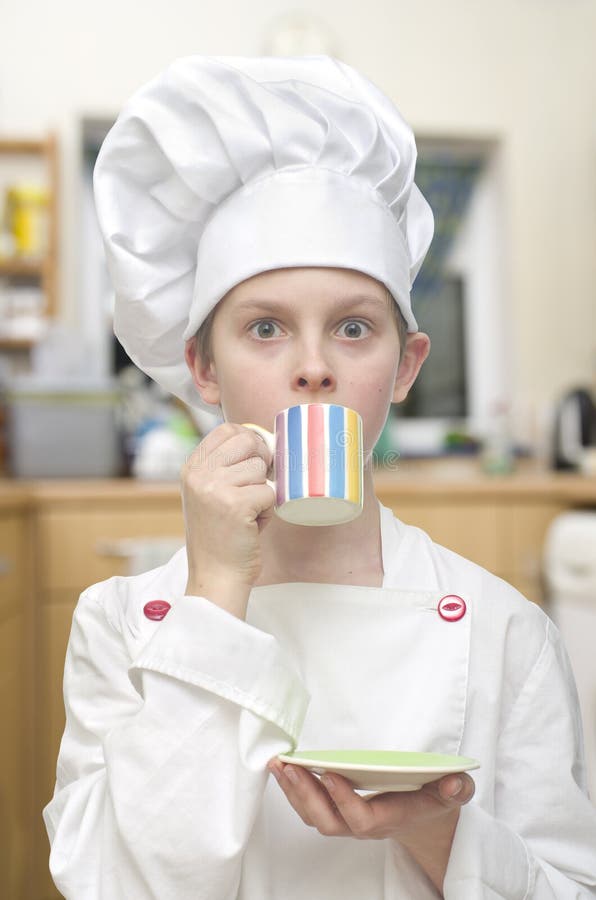 Young Boy Dressed As Chef Drinking Tea White Background Stock Photos ...