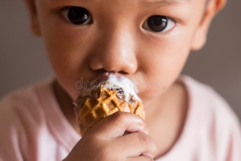 Young Boy Eat Ice Cream Face Close-up Stock Image - Image of smile ...