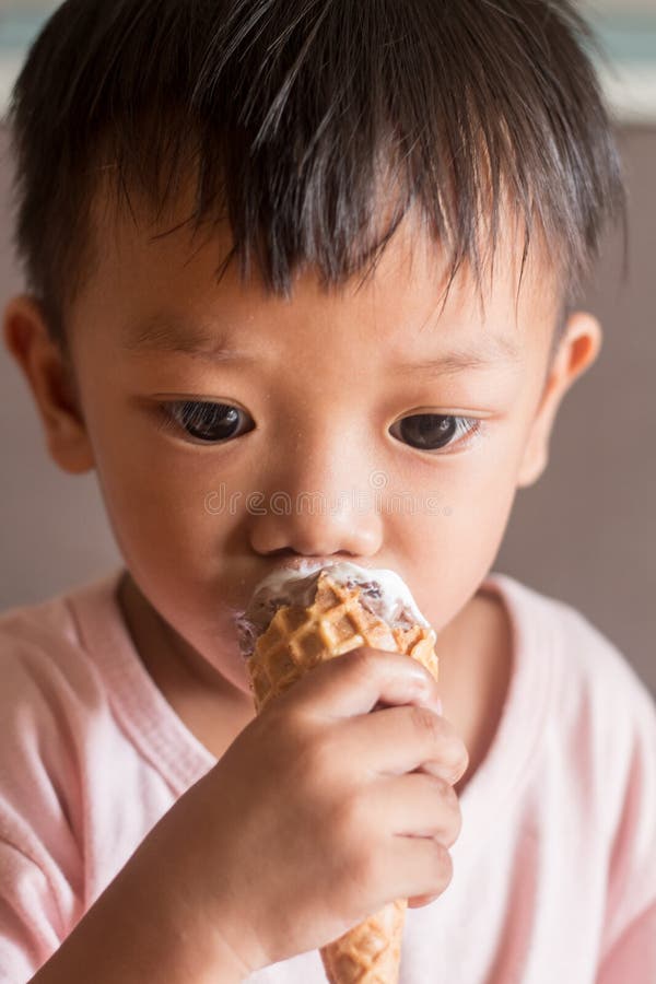 Young Boy Eat Ice Cream Face Close-up Stock Image - Image of smile ...