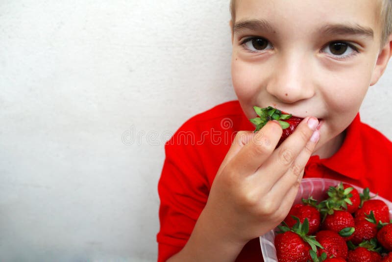 Young Boy Eating a Ripe Strawberry. Stock Image - Image of emotions ...