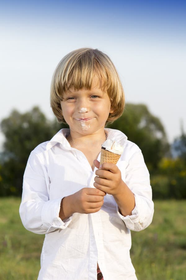 Boy with Chocolate Ice Cream Stock Image - Image of warm, little: 32415223