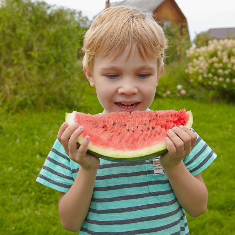 Young Boy Eating Watermelon Stock Photo - Image of juicy, male: 73274272