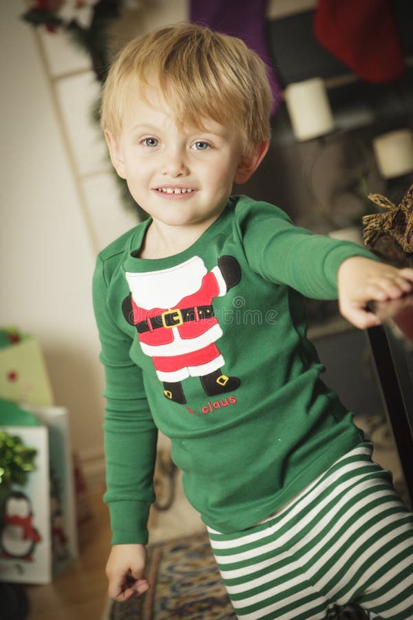 Young Boy Enjoying Christmas Morning Near the Tree Stock Image - Image ...