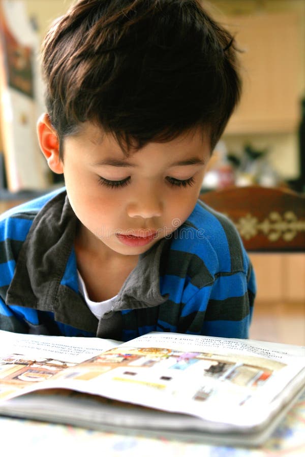 Young Boy Enjoying His Reading Stock Image - Image of recognize ...