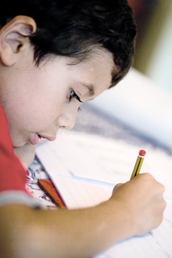 Young Boy Enjoying His Writing Homework Stock Image - Image of develop ...