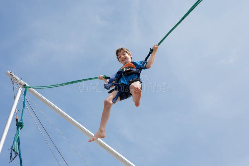 Young Boy Enjoying Jumping with Trampoline Jumping Rope Stock Image ...