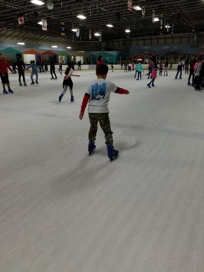 Ice skating editorial image. Image of break, child, young - 123895655