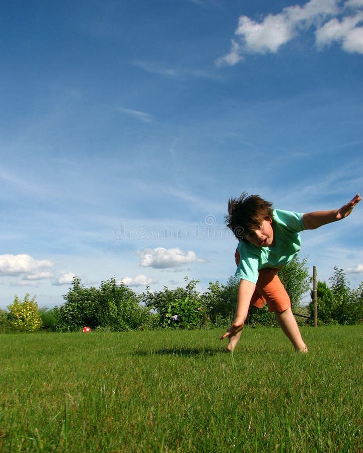 Young Boy Exercising in the Garden Stock Photo - Image of nature ...