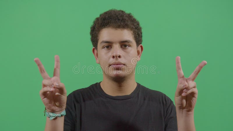 Young Boy Expressing Peace stock video. Video of chroma - 159139999