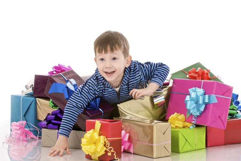 Young boy and fancy boxes stock image. Image of holiday - 12091045