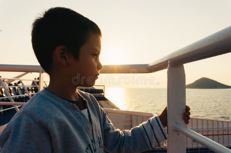 Young boy on a ferry-boat stock photo. Image of travel - 51565338