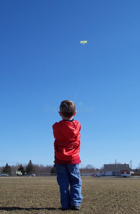 Young boy flying a kite stock photo. Image of flying, little - 5398870