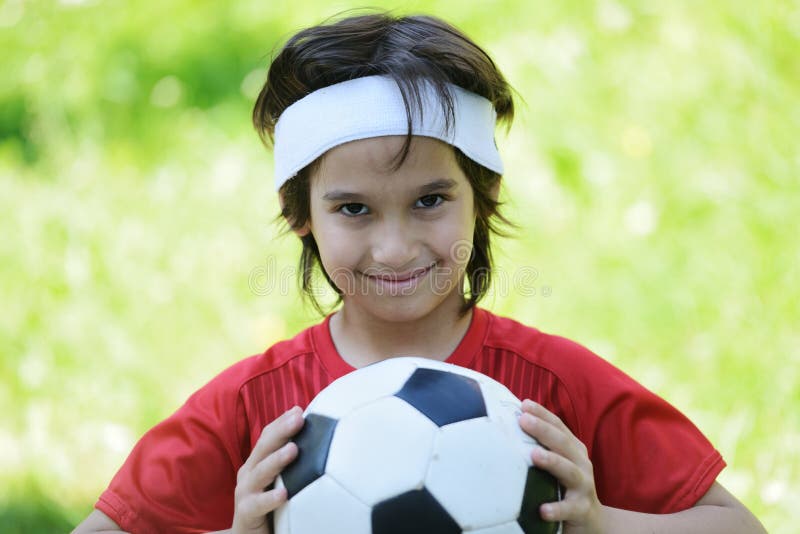 Young Boy in Football Team stock photo. Image of person - 12406134