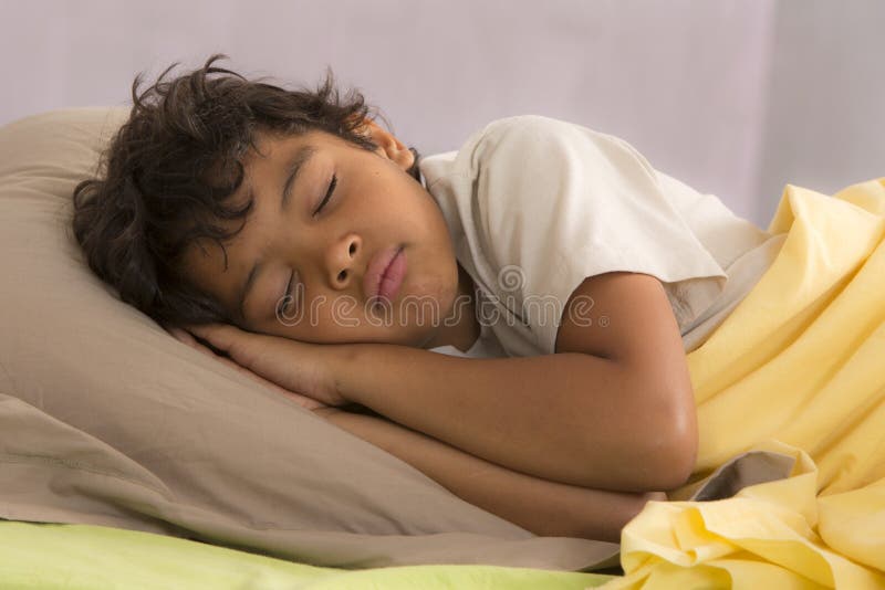 Young Boy Fully Sleeping His Bed Stock Photos - Free & Royalty-Free Stock Photos from Dreamstime