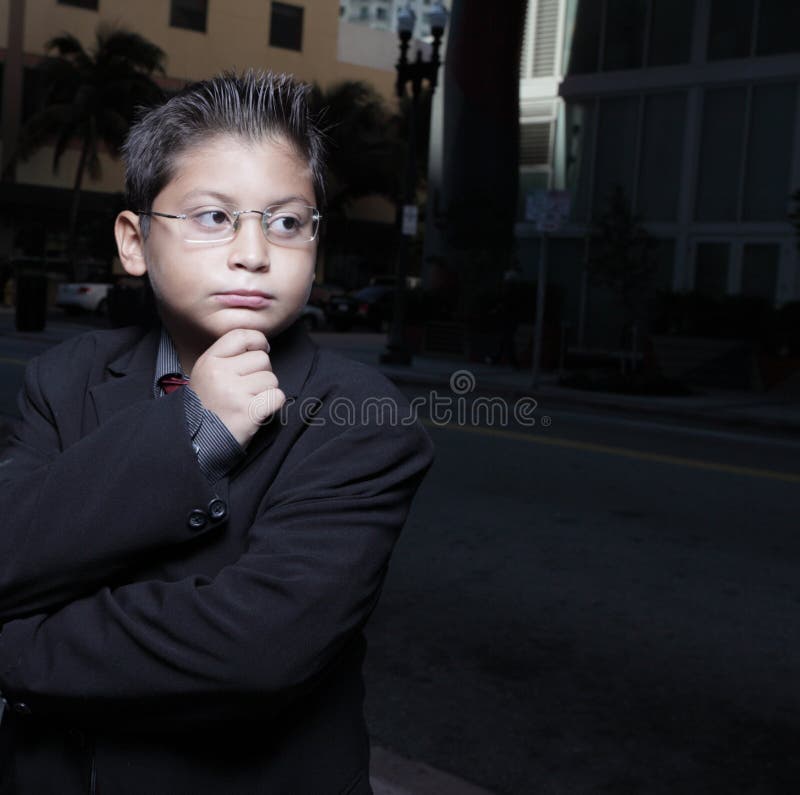 Young boy pondering stock image. Image of pensive, copy - 7597725