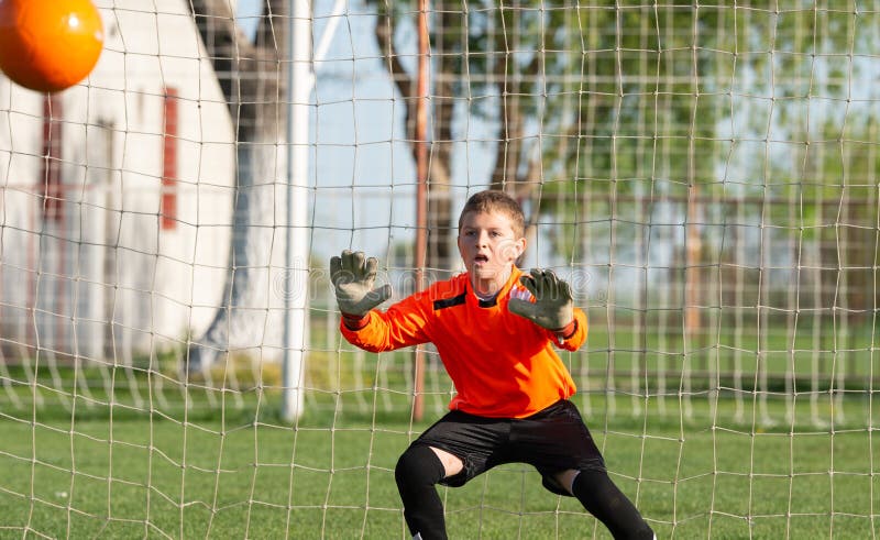 Young Boy Goalkeeper stock photo. Image of green, game - 307399320