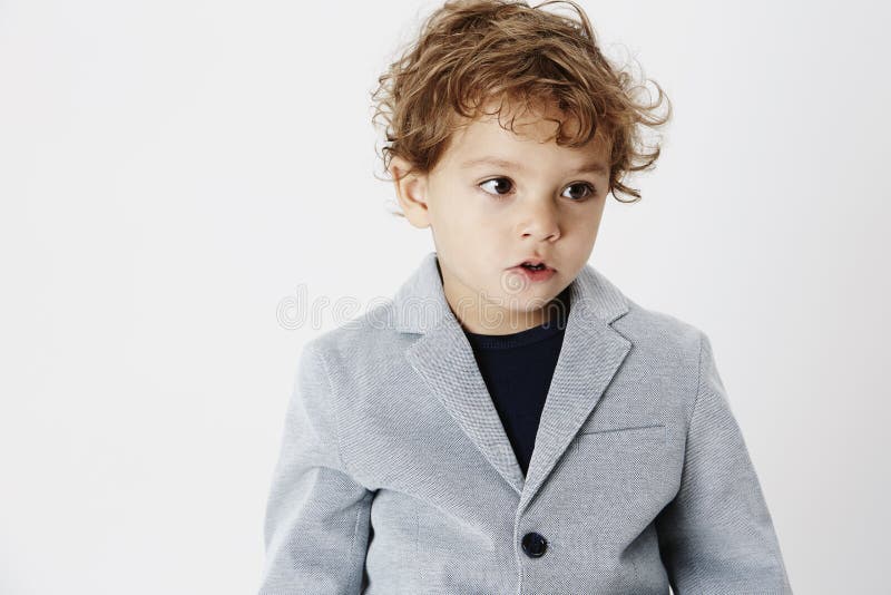 Young Boy on Grey Background Stock Photo - Image of preschooler, cute ...