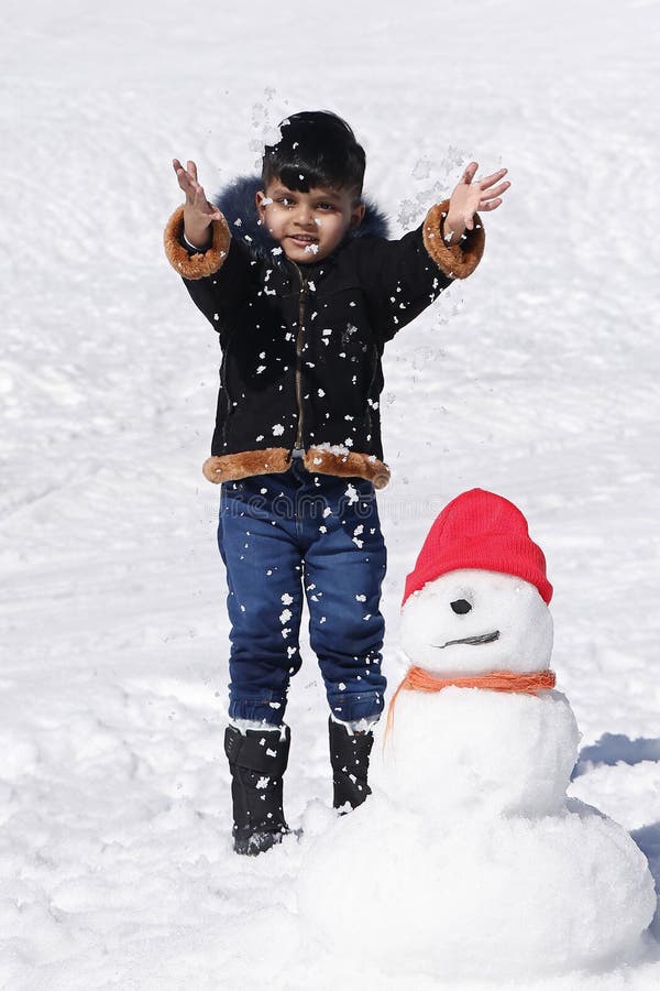 Young Boy Having Fun Activity in Winter with Snow and Ice Stock Photo ...