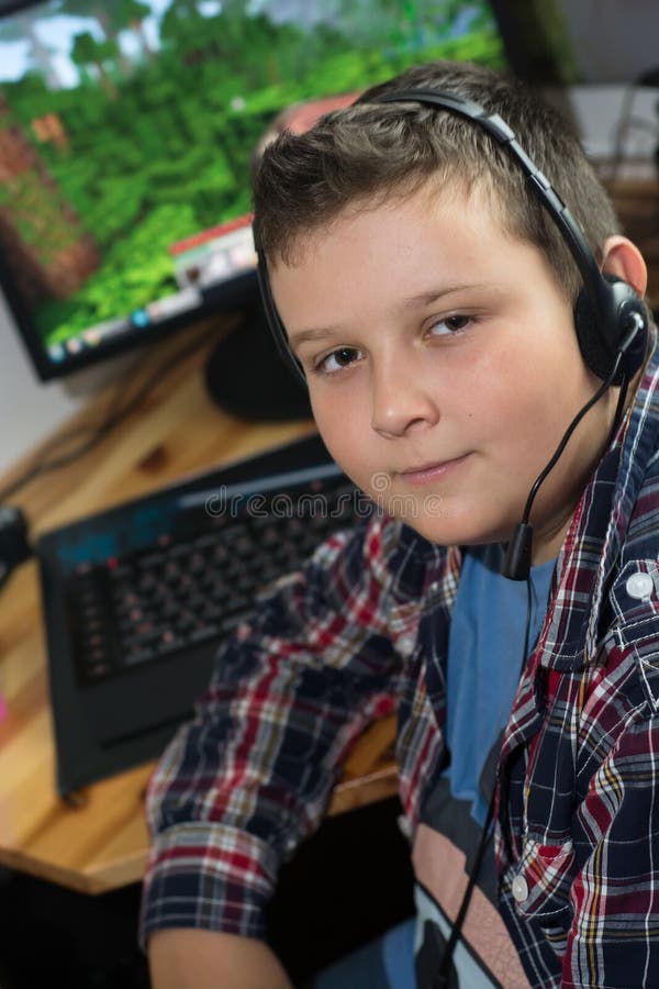 Young Boy in Headset Playing Pc Game Stock Photo - Image of gaming ...