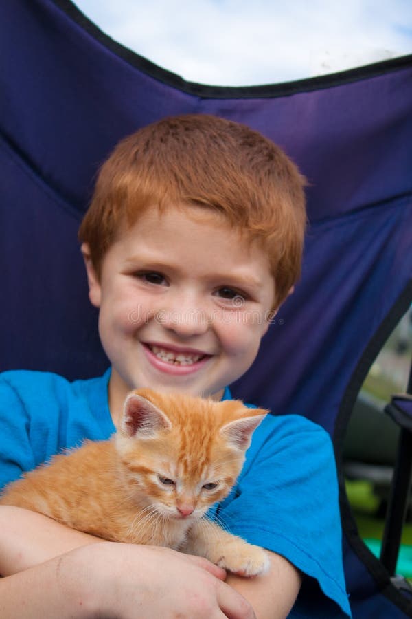 Young Boy and His New Kitten Stock Image - Image of curious, small ...