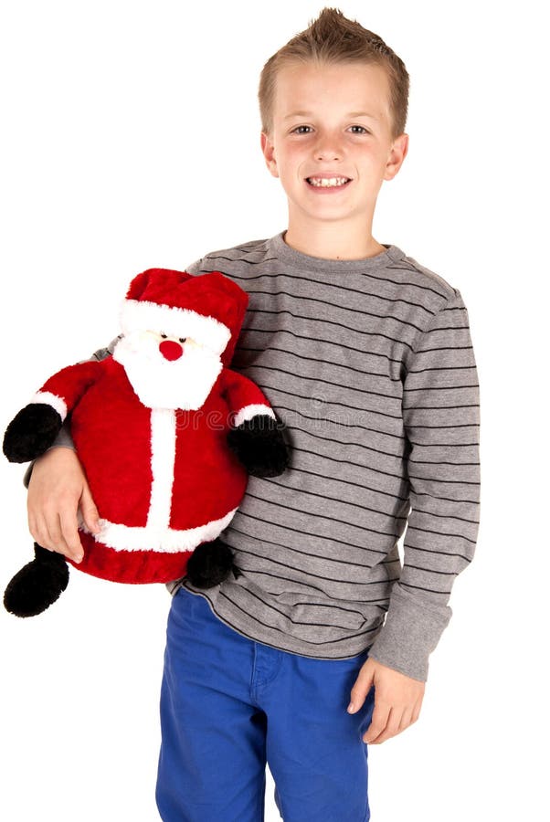 Young Boy Holding a Stuffed Santa Smiling Happily Stock Photo - Image ...