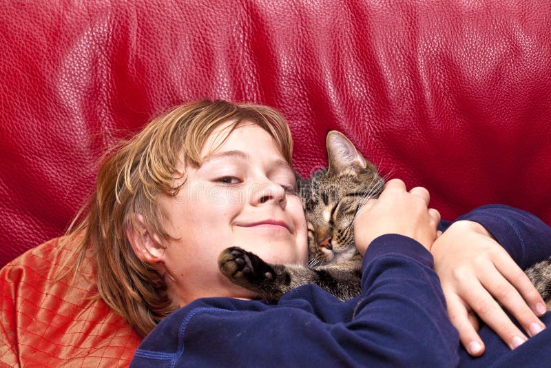 Boy hugging with his cat stock image. Image of cute - 111382267