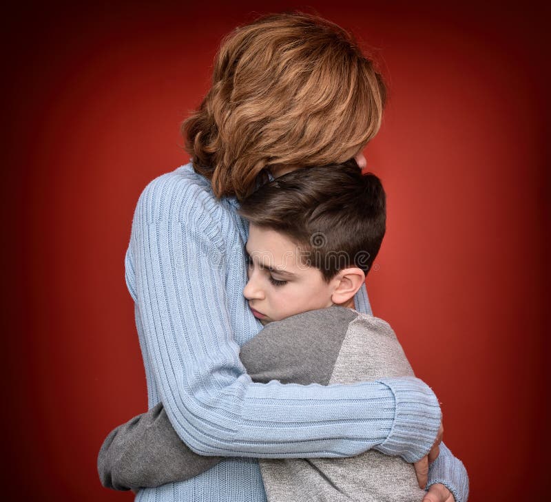 Young Boy Hugging His Mother Stock Photo - Image of embrace, misery ...