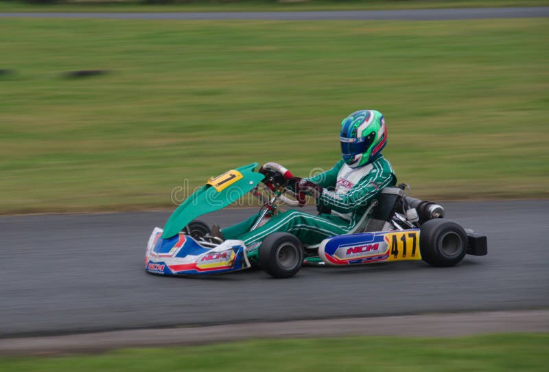 Young Boy Karting on Track with Oversized Helmet Editorial Stock Photo ...