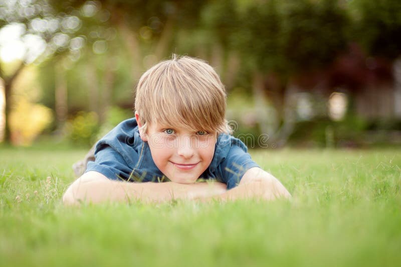 1,125 Boy Field Laying Stock Photos - Free & Royalty-Free Stock Photos ...