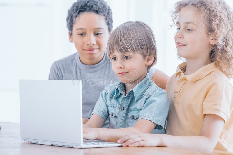 Young boy learns stock image. Image of friend, laptop - 96878949