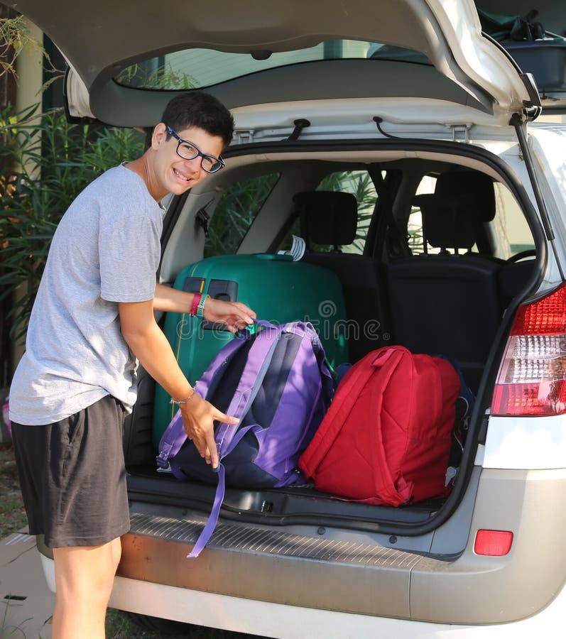 Young boy loads the car stock image. Image of children - 113704045