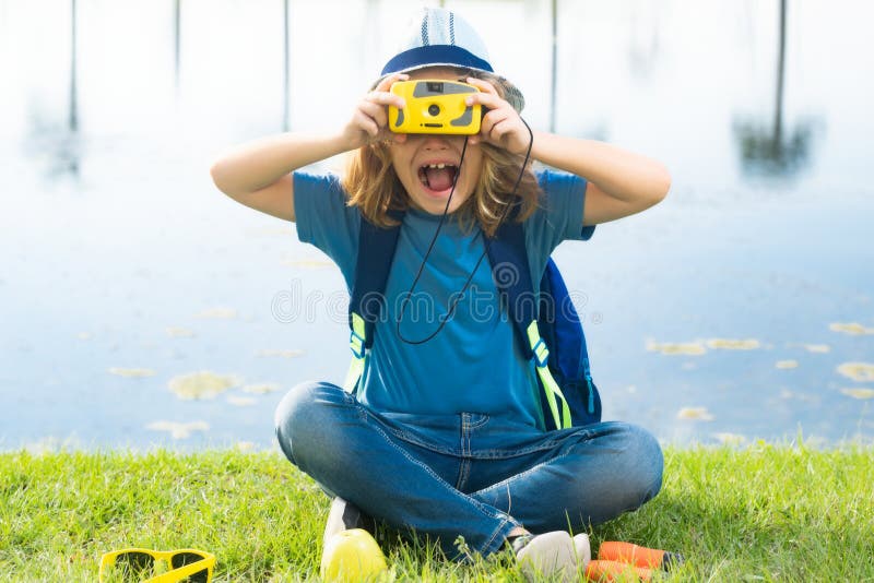 Young Boy Looking through Binoculars. Scout Boy Wearing Explorer Hat ...