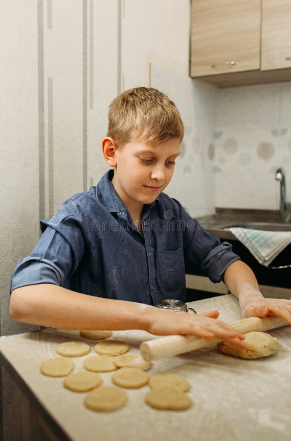 Young Boy Making Cookies on Counter Stock Photo - Image of culinary ...