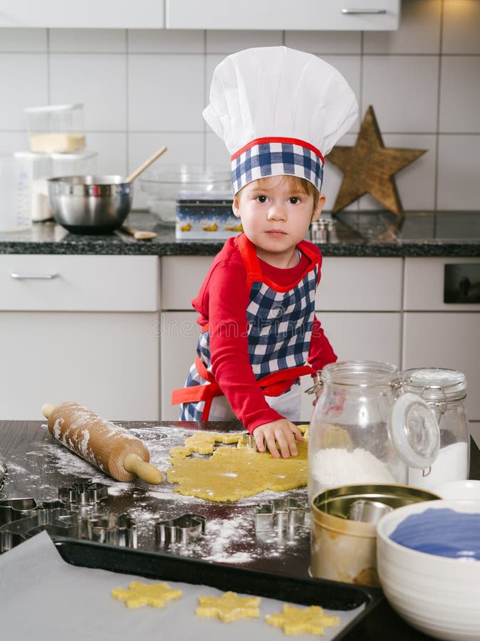 Young boy making cookies stock image. Image of childhood - 35862197