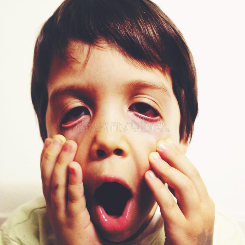 Young boy making faces stock image. Image of playful - 38176743