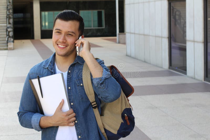 Young Boy Making Fun Plans on the Phone with Space for Copy Stock Photo ...