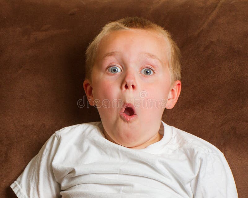Young Boy Making a Surprised Facial Expression Stock Photo - Image of ...