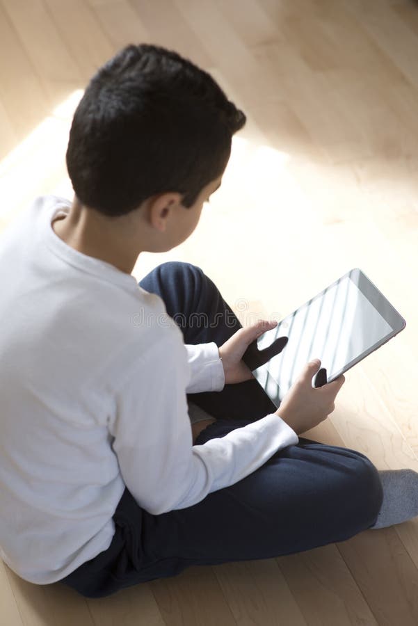 Young Boy with a Mobile Tablet Computer. Stock Image - Image of ...