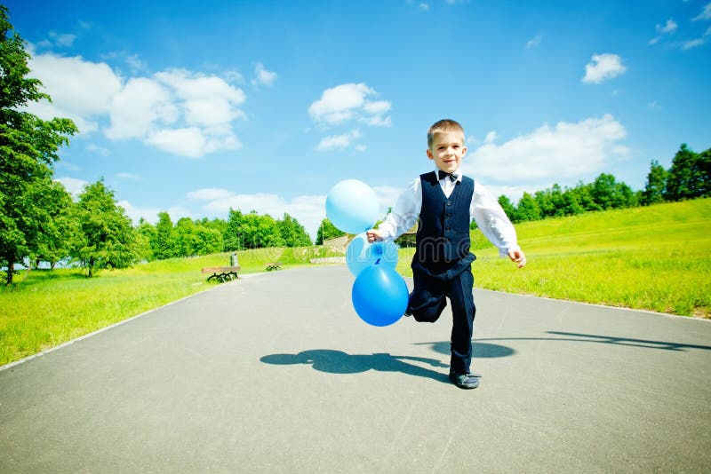 Boy With Balloons Picture. Image: 18093275