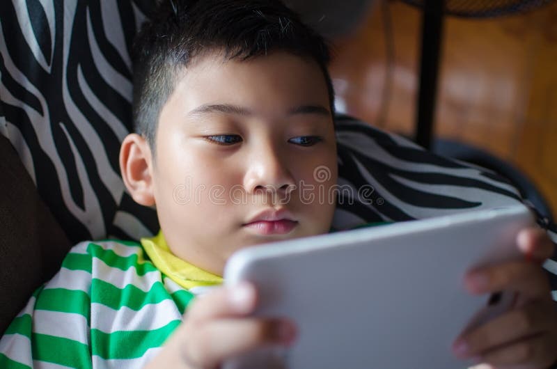 New Generation Kid Using New Technology To Play Stock Photo - Image of ...