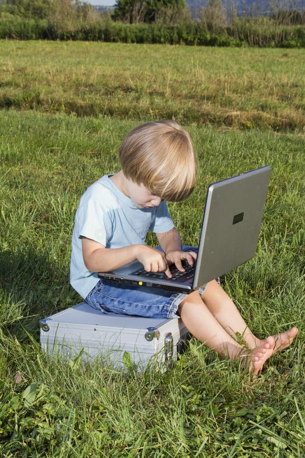 Young boy with notebook stock photo. Image of little - 25469692