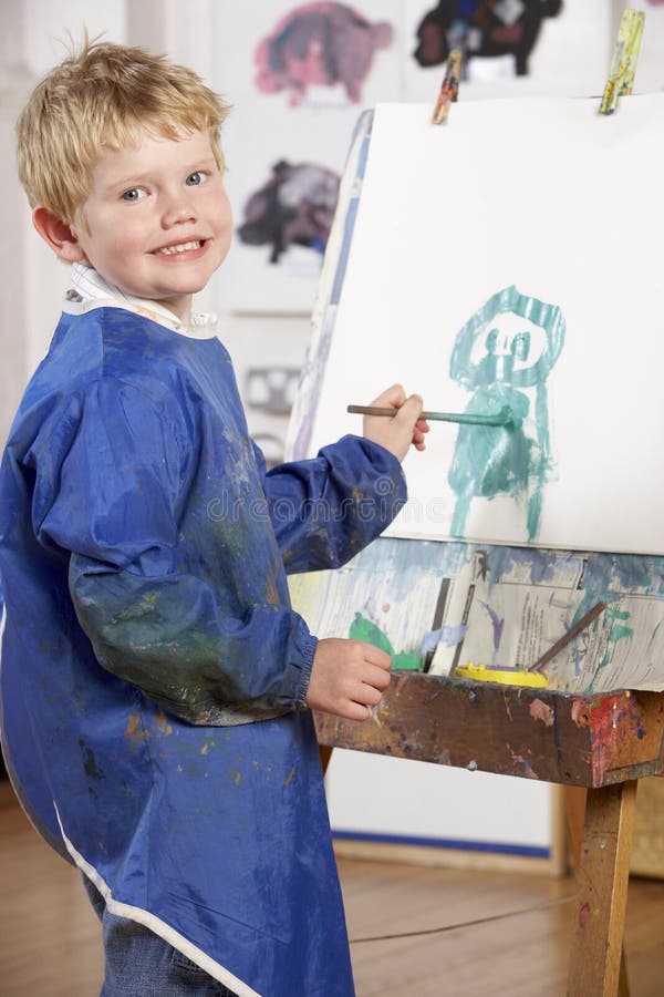 Young Boy Painting stock image. Image of space, painting - 10971695