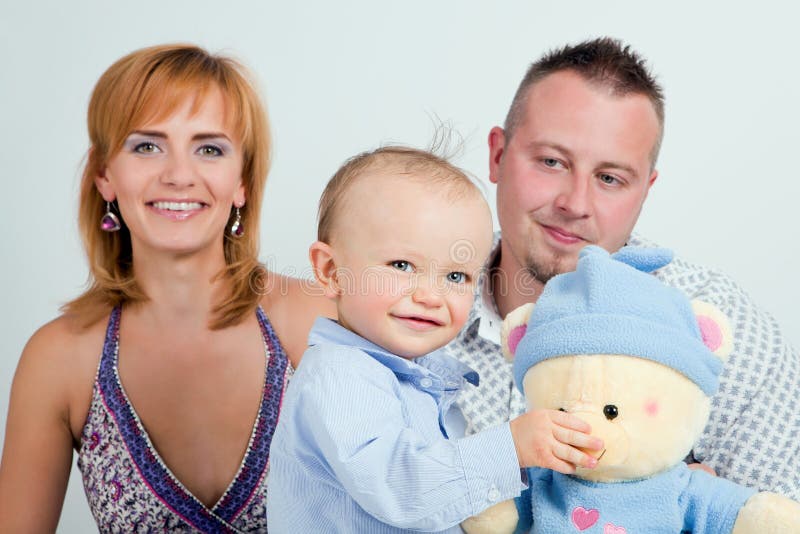 Young boy with parents stock image. Image of mother, laughing - 22306697