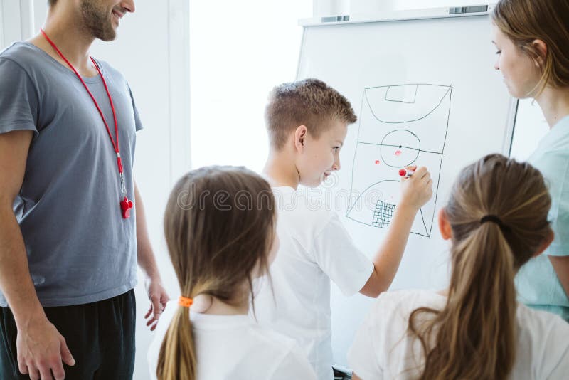 Boy planning the tactic stock photo. Image of player - 156382706