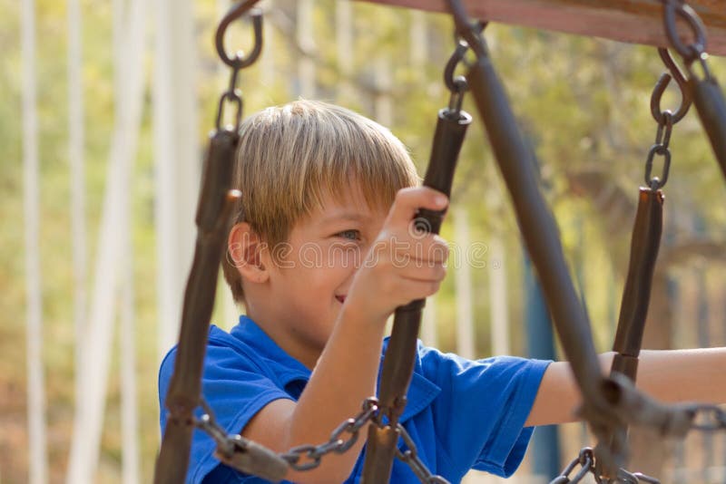 Young Boy on the Playground Stock Image - Image of little, playfield ...