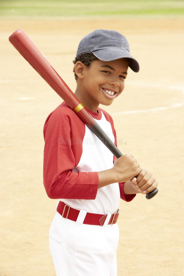 Young Boy Playing Baseball stock image. Image of holding - 12406061